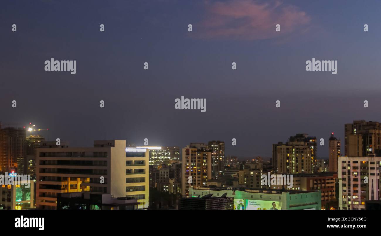 City skyline under a clear sky with modern buildings Stock Photo - Alamy