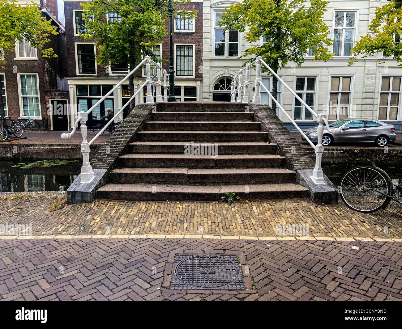 Old, Heavily Refurbished, Mediaval Bridge over a Down Town Canal ...