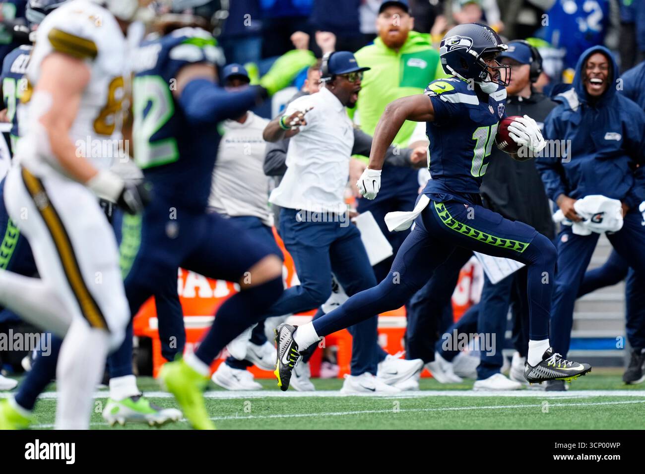 Seattle Seahawks wide receiver Tory Horton (15) returns a punt for a ...