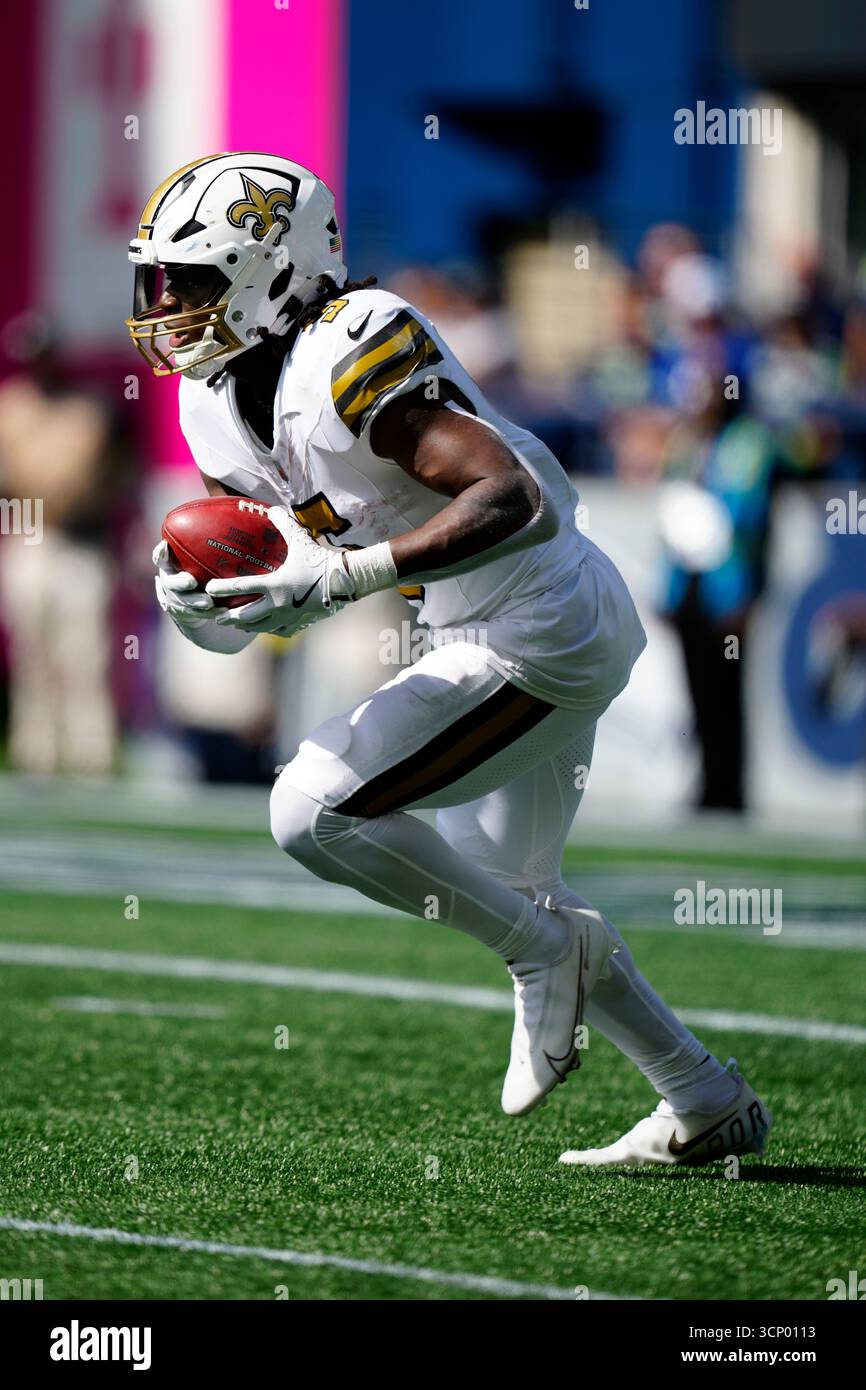 New Orleans Saints running back Kendre Miller (5) runs with the ball ...