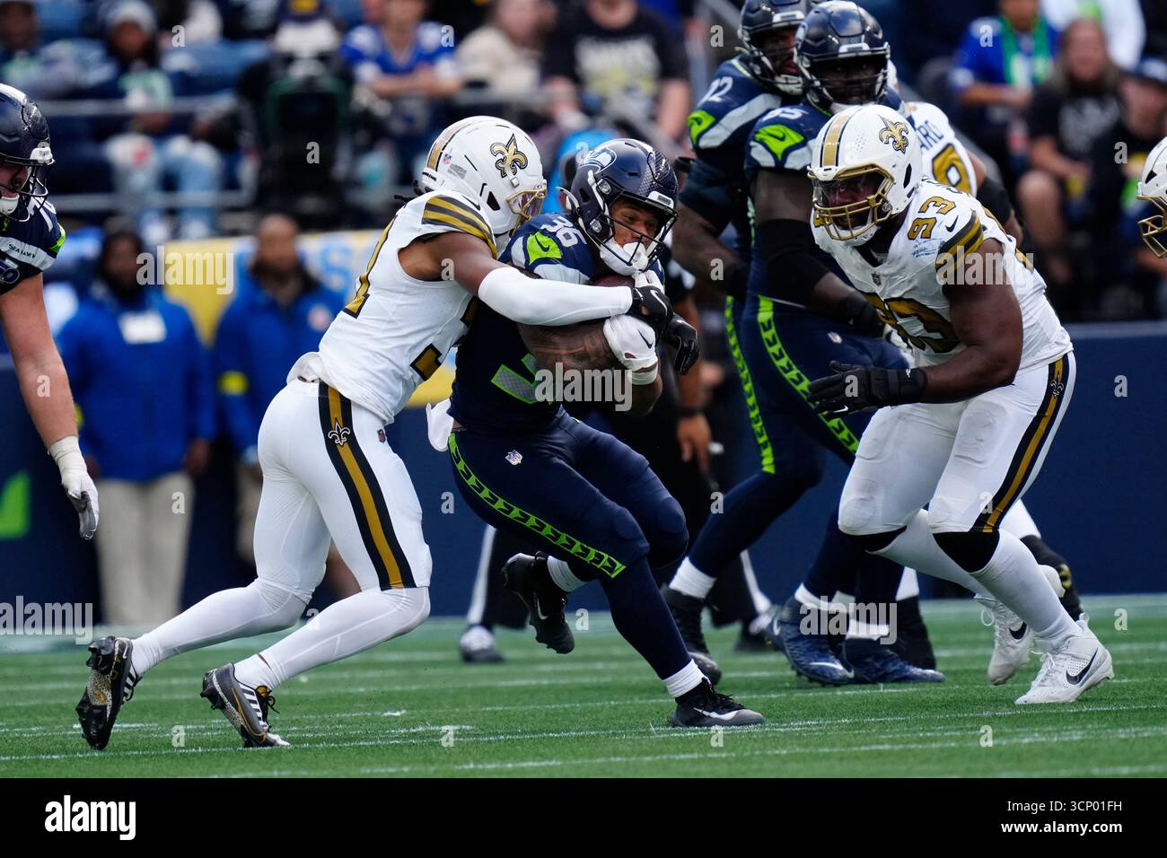 Seattle Seahawks running back George Holani (36) runs with the ball ...