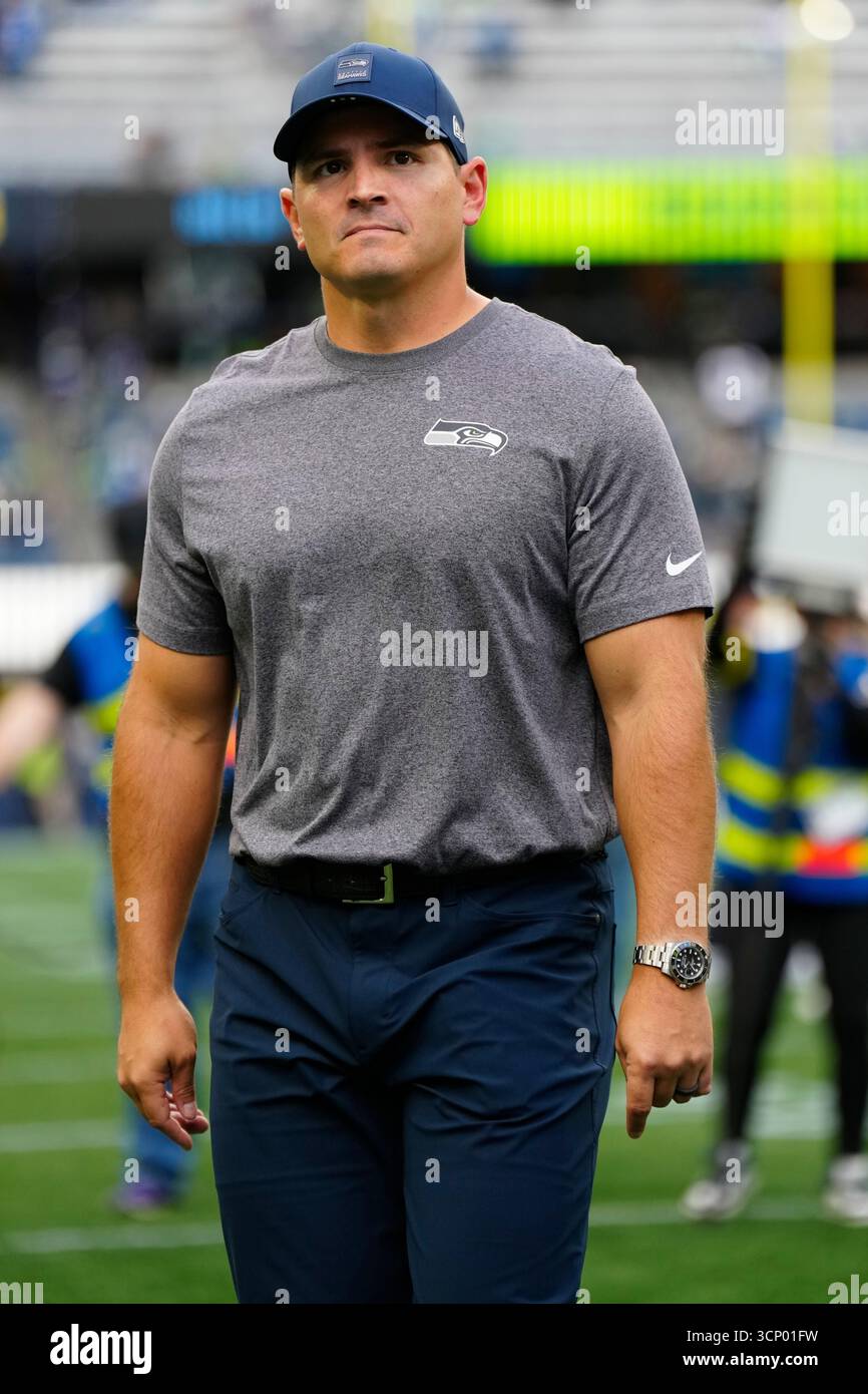 Seattle Seahawks head coach Mike Macdonald walks off the field after an ...
