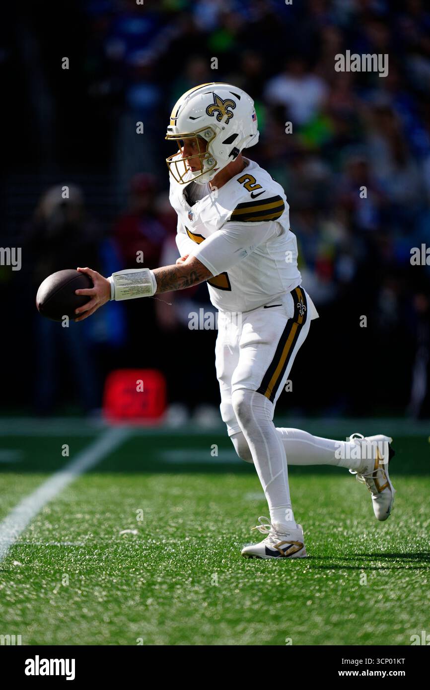 Seattle Seahawks quarterback Drew Lock (2) hands off the ball during an ...