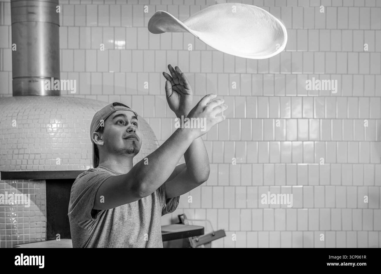 Pizza dough man Black and White Stock Photos & Images - Alamy