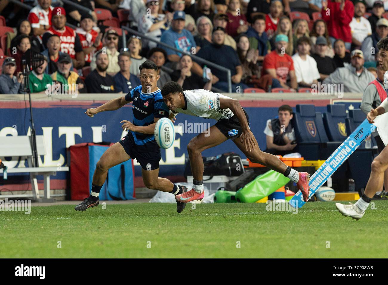 Fiji's Ponipate Loganimasi watches the ball against Japan's Charlie ...