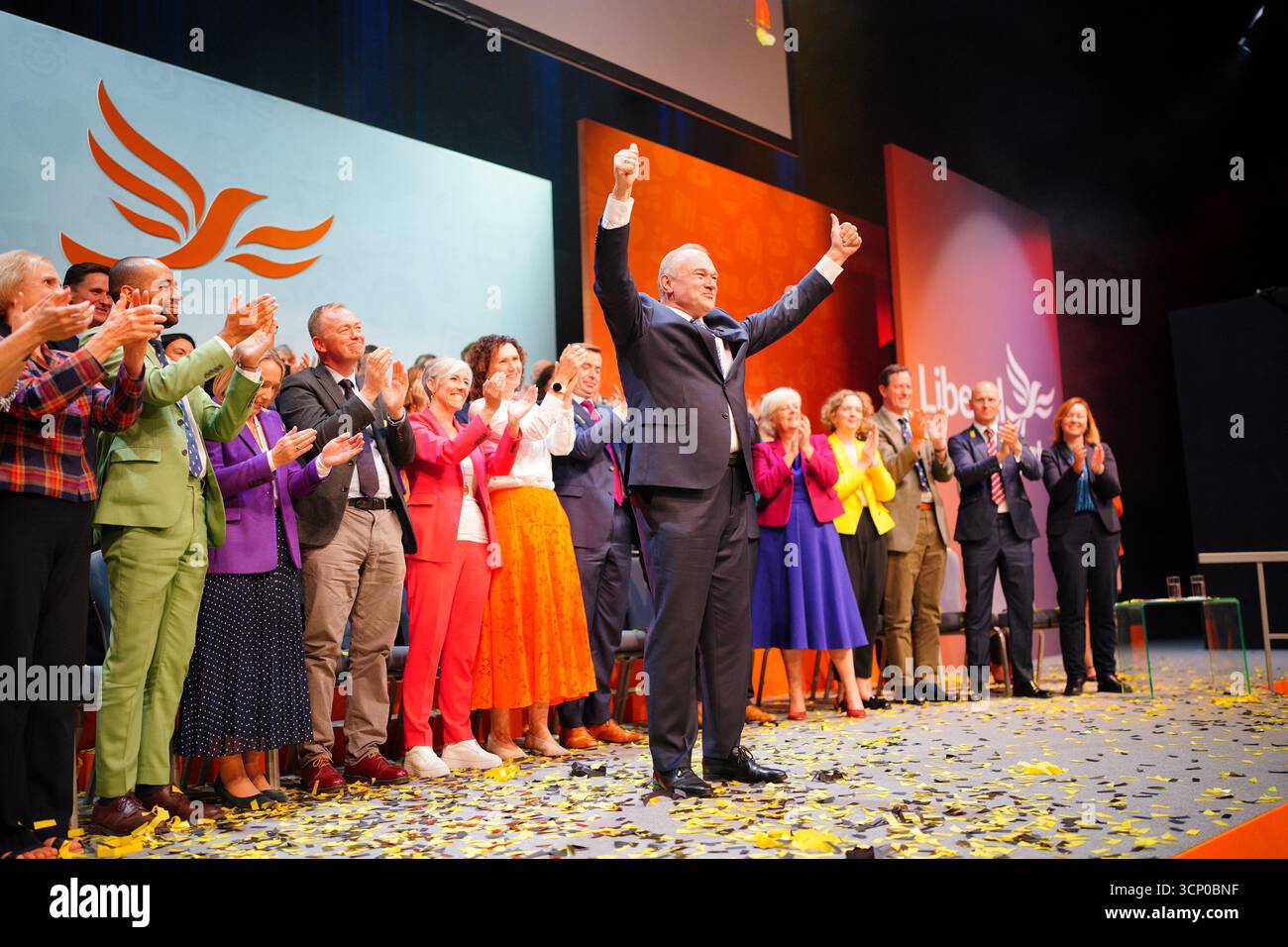 Liberal Democrats leader Sir Ed Davey waves after delivering his speech ...