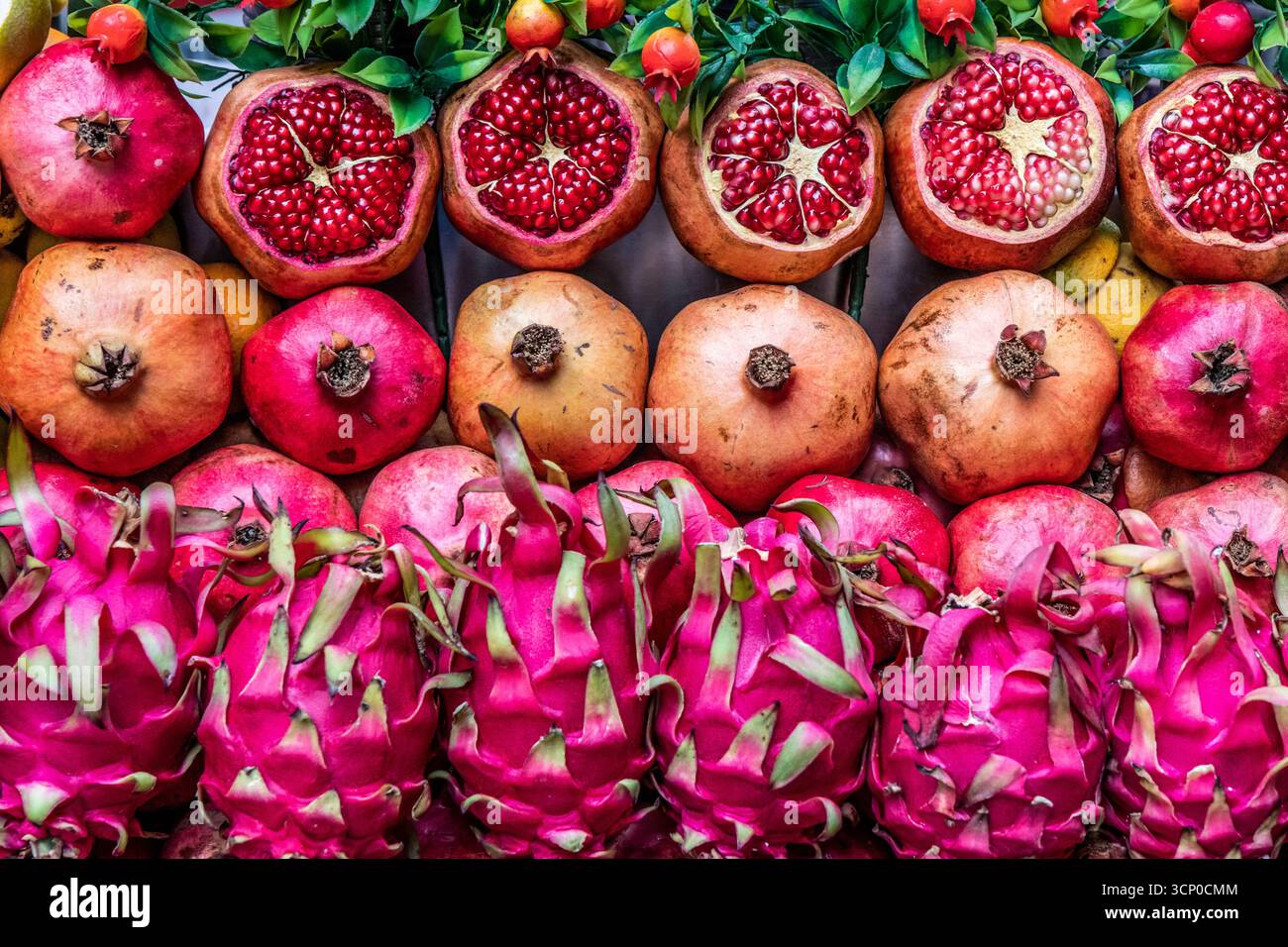 Fresh dragon fruits pomegranates hi-res stock photography and images ...