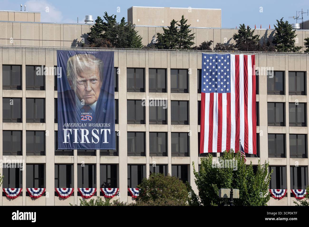 An image of Donald Trump is seen on the exterior of Labor Dept ...