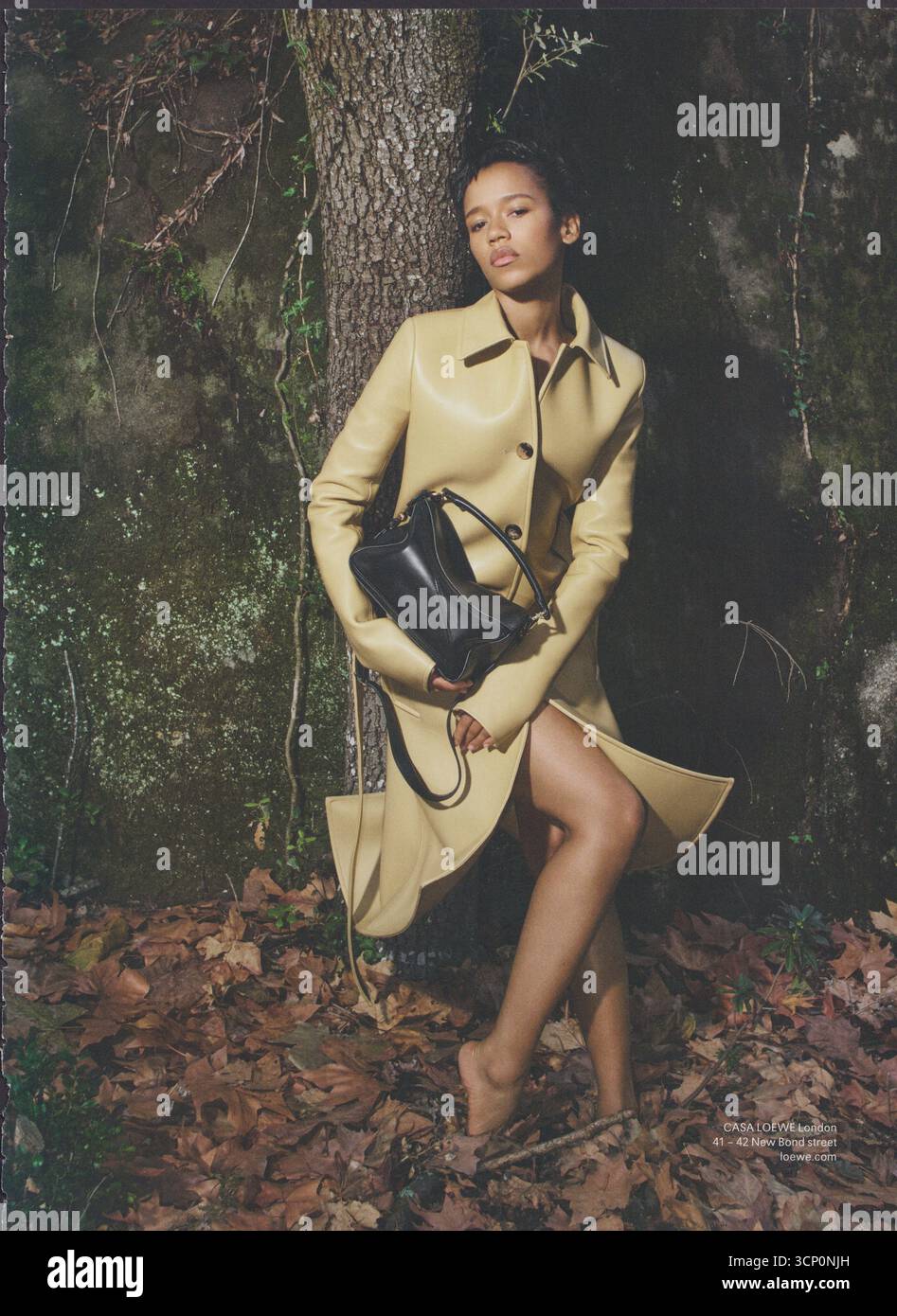 poster advertising Loewe fashion house with Taylor Russell in paper ...