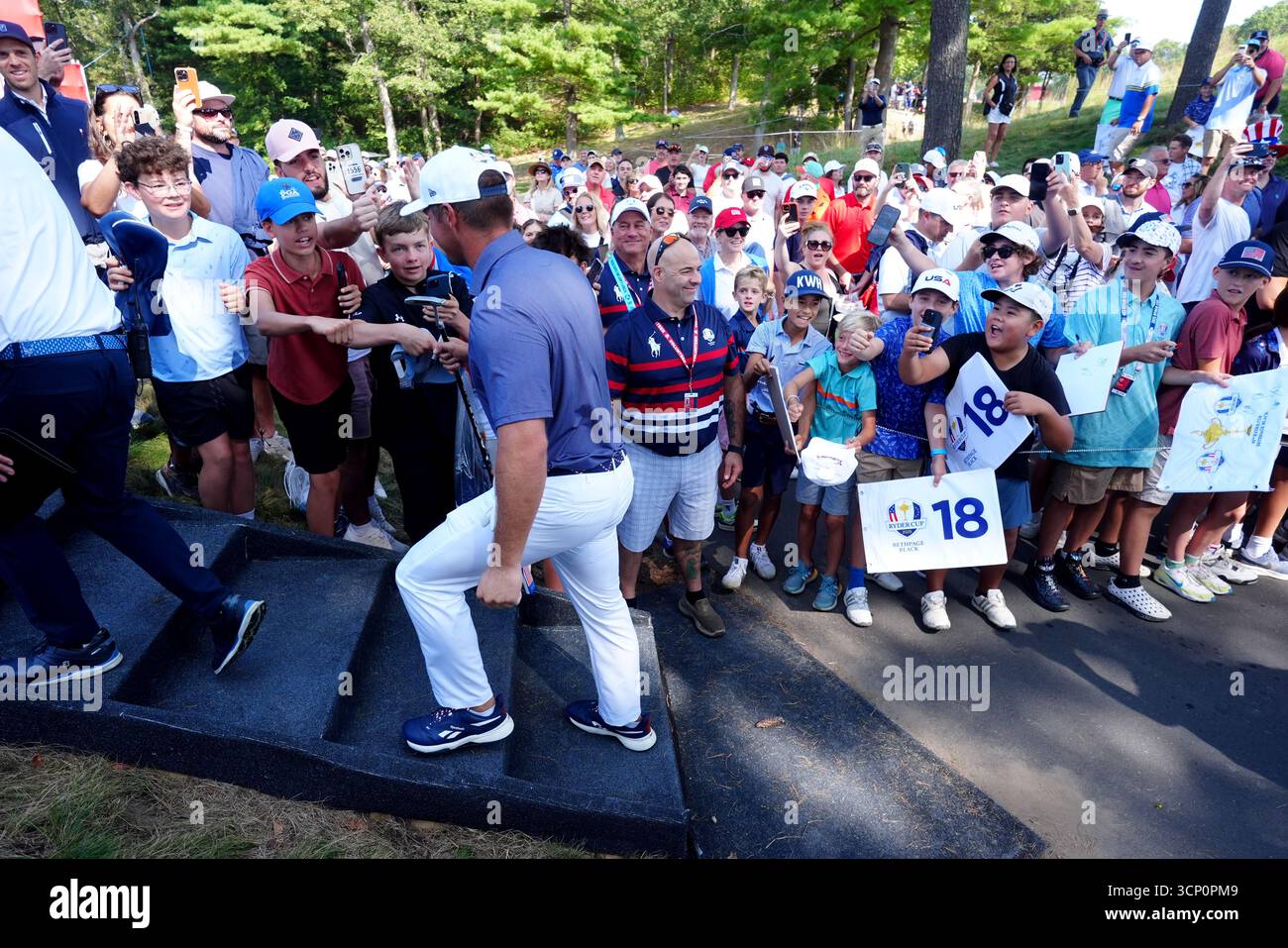 Bryson DeChambeau of Team United States with spectators at the Bethpage ...