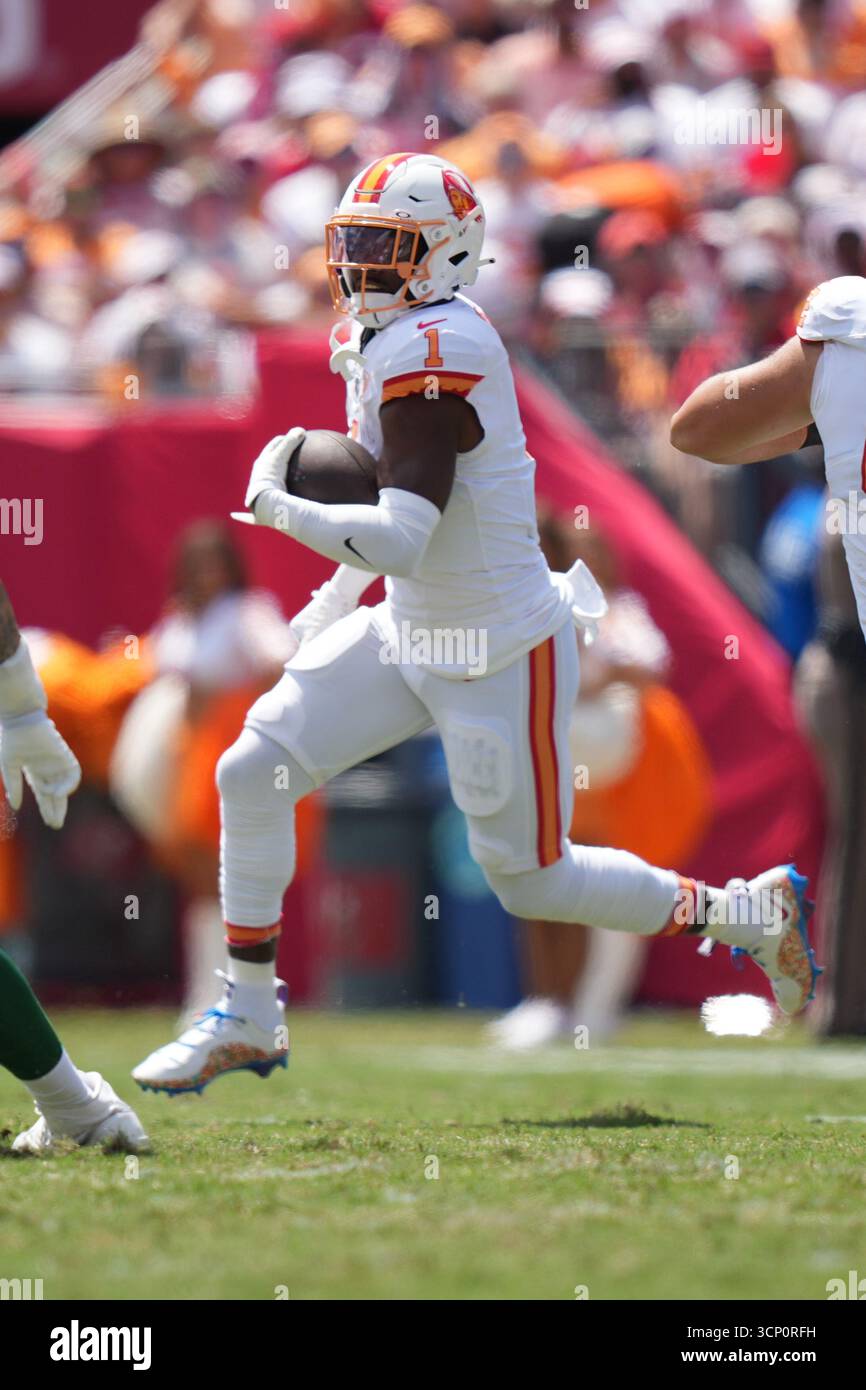 Tampa Bay Buccaneers running back Rachaad White (1) rushes with the ...