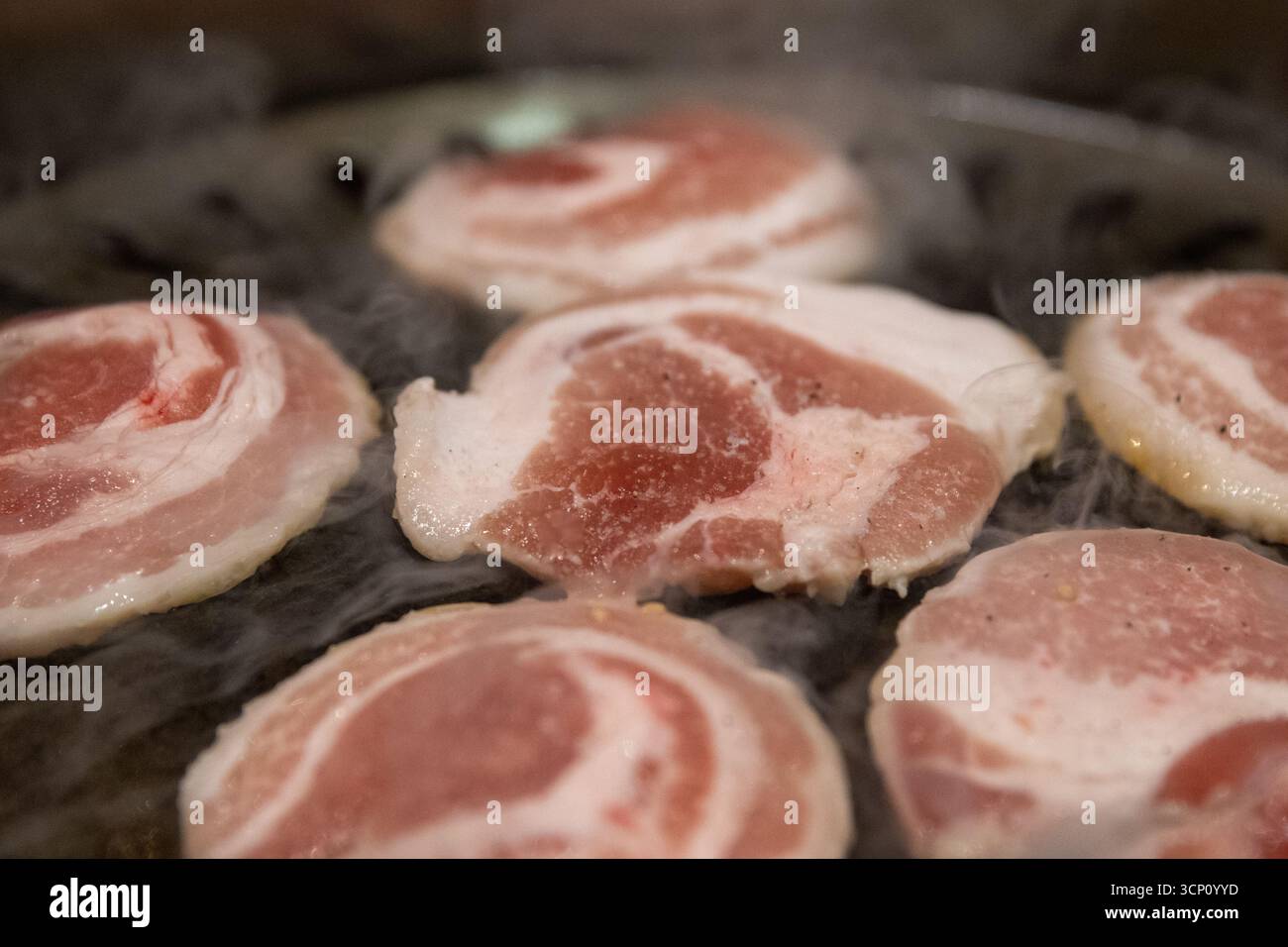 Sizzling bbq preparation close up hi-res stock photography and images ...