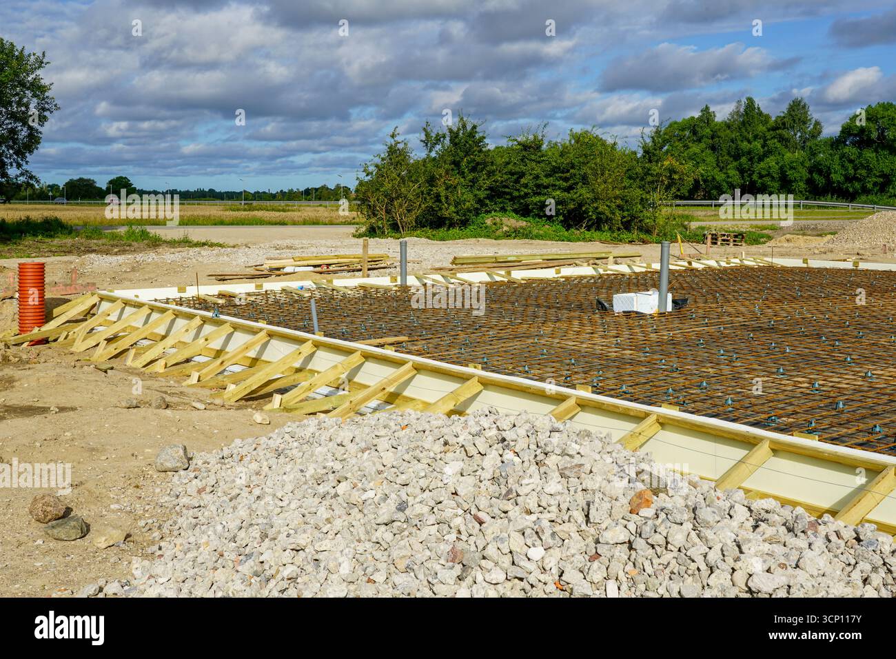 Thermal insulated concrete foundation with steel rebar grid, wooden ...