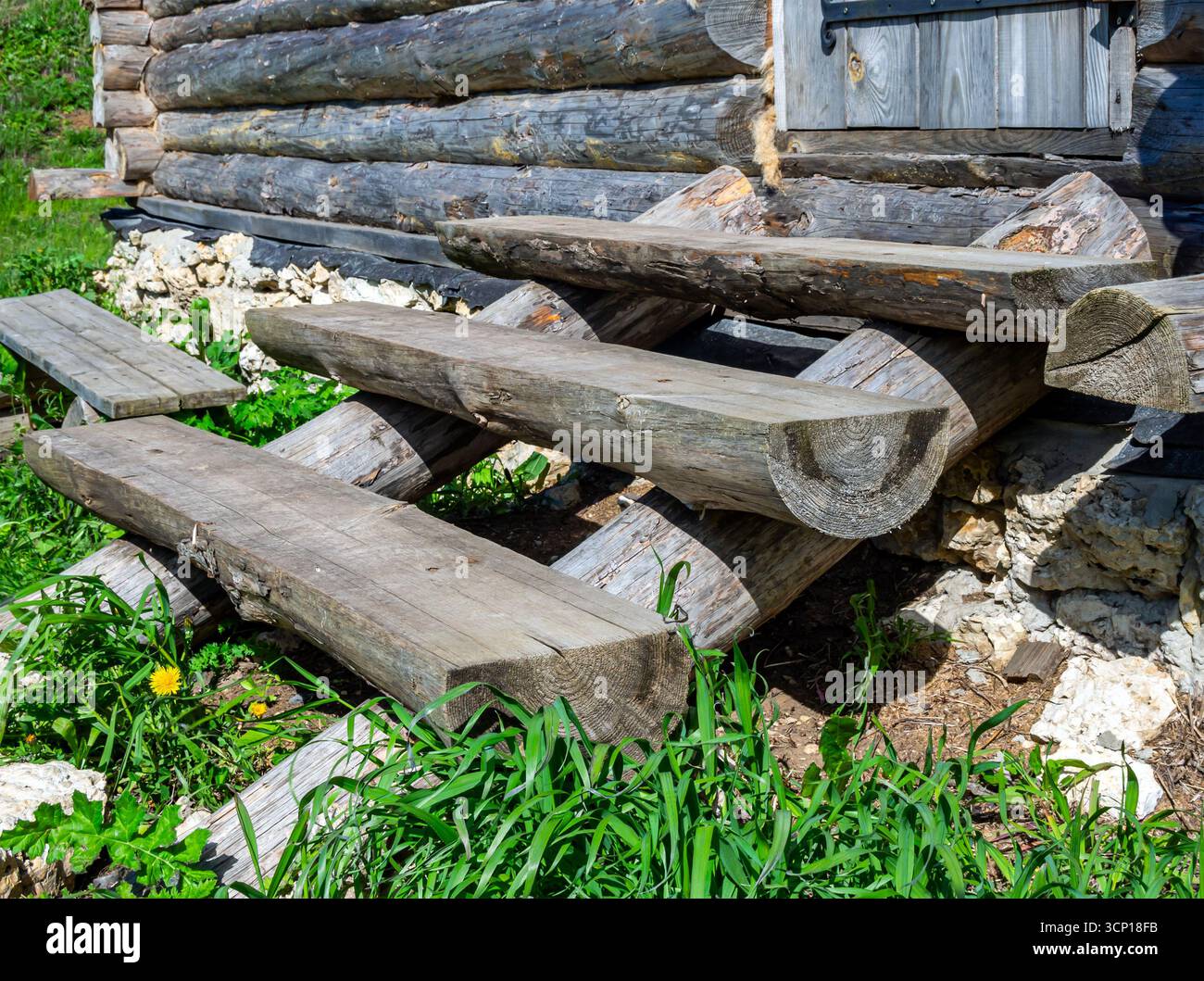 Wooden porch made from logs sawn in half lengthwise Stock Photo - Alamy