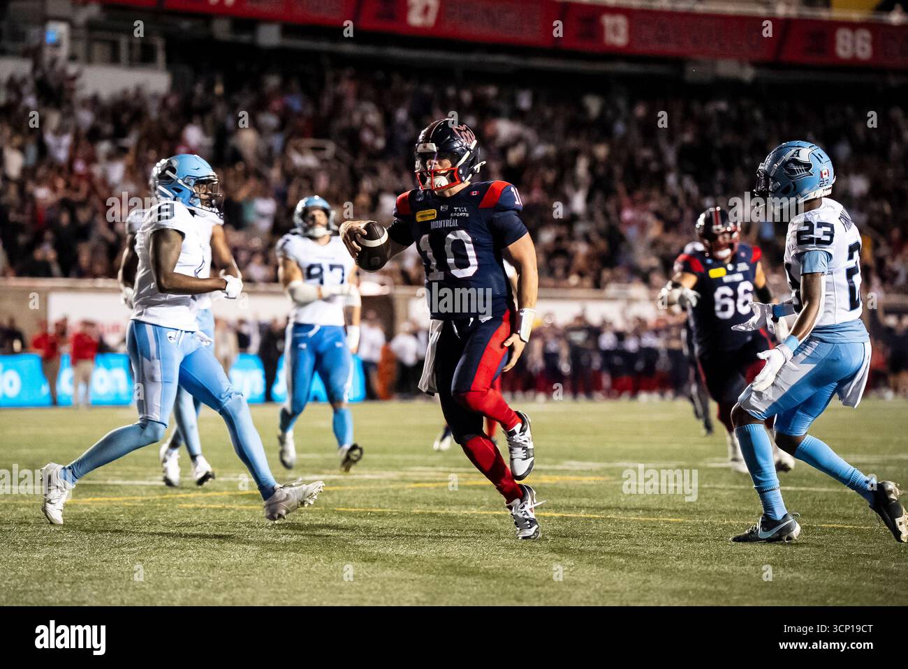 Montreal Alouettes quarterback Davis Alexander (10) scores during ...