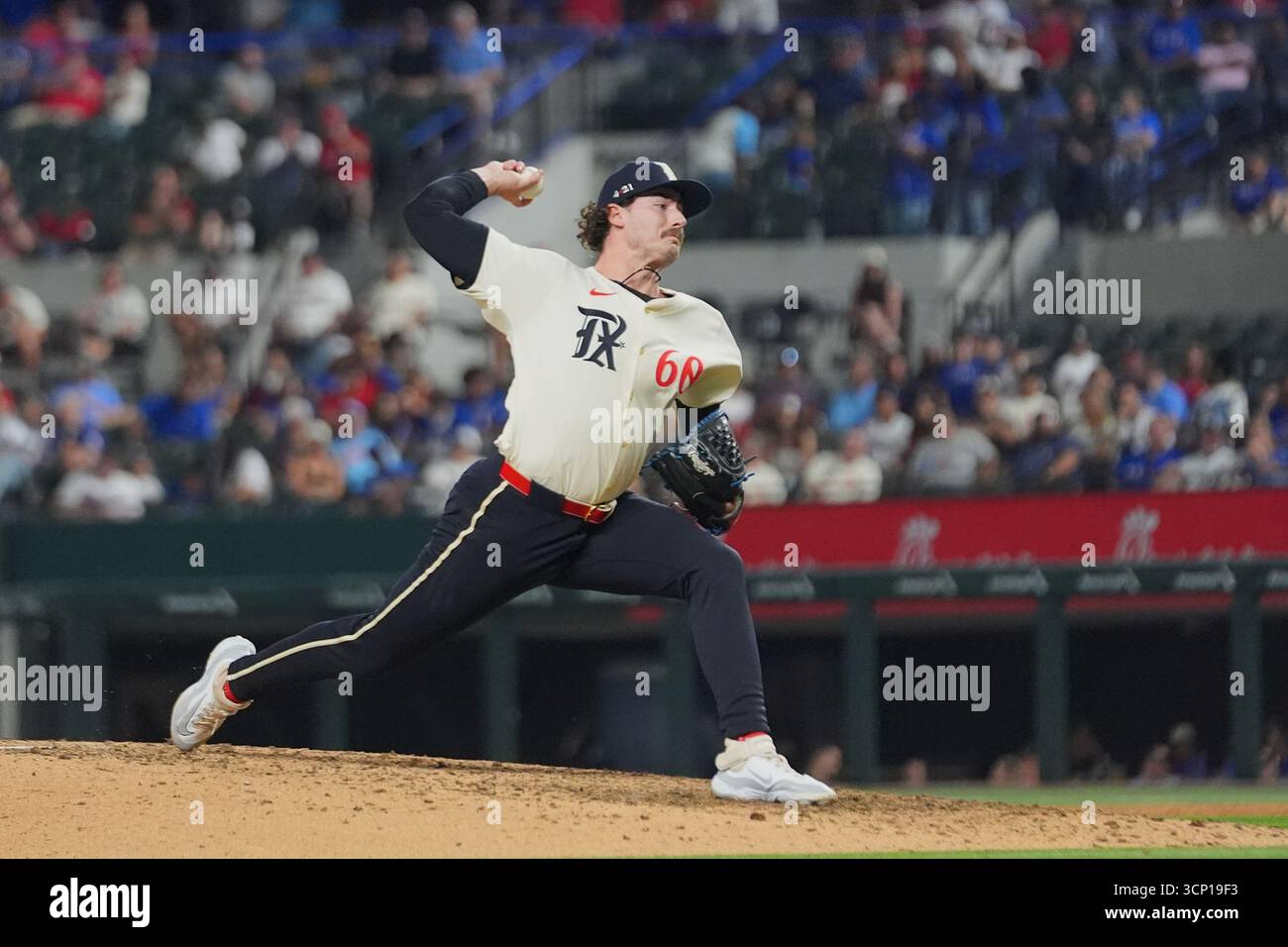Texas Rangers pitcher Cole Winn throws to the Miami Marlins during the ...