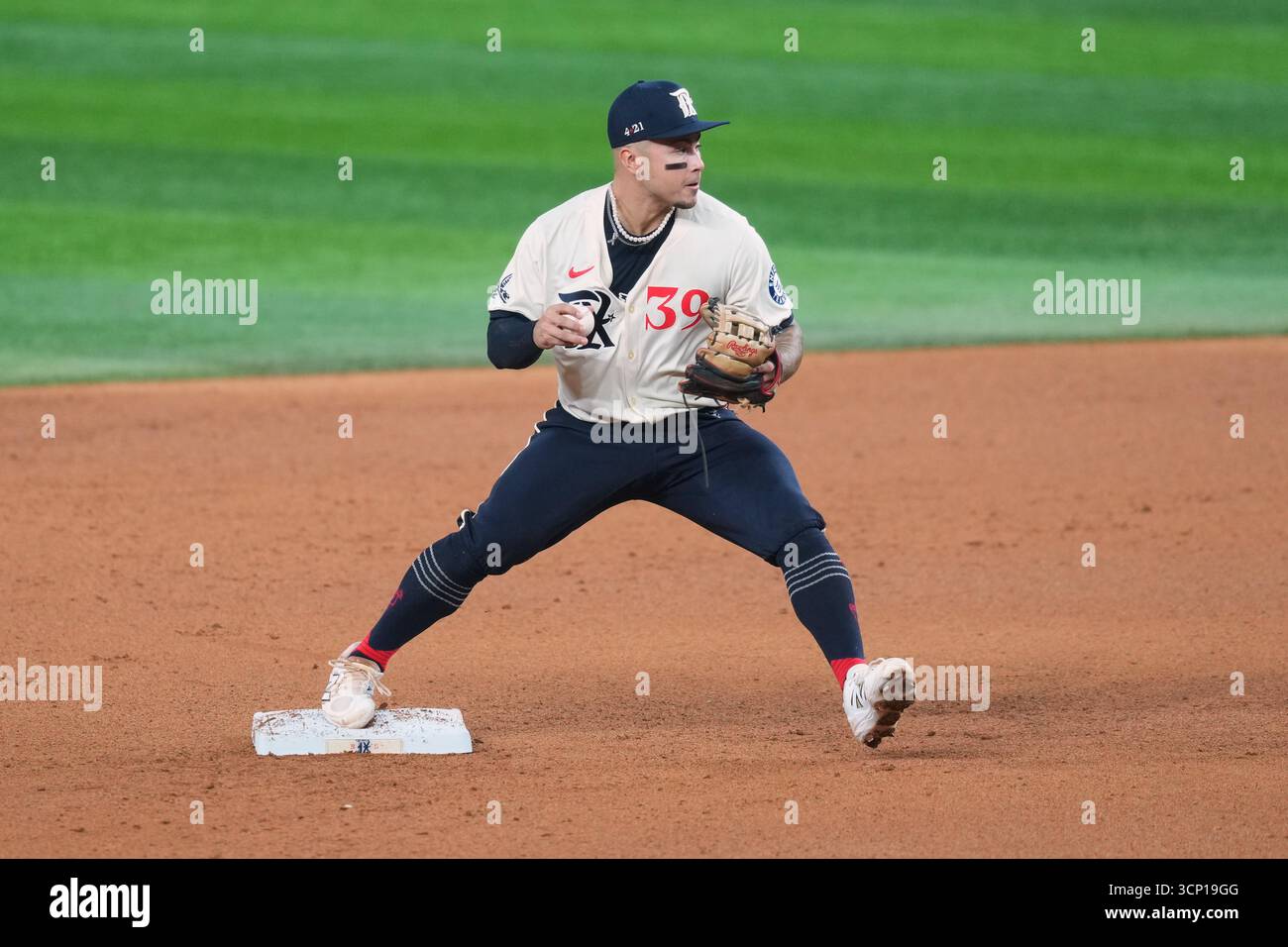Texas Rangers second baseman Cody Freeman attempts to turn a double ...