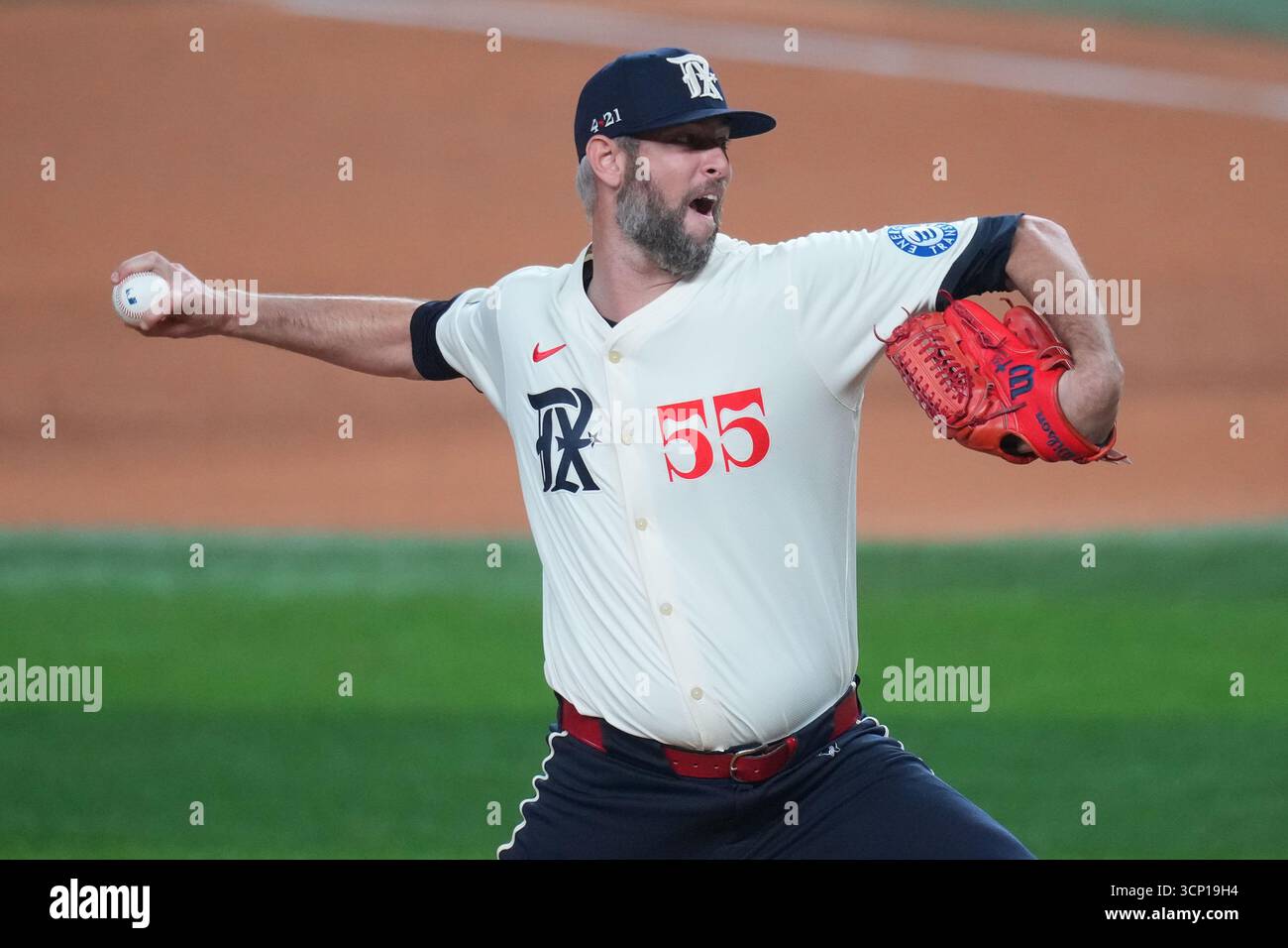 Texas Rangers pitcher Chris Martin throws to the Miami Marlins during ...