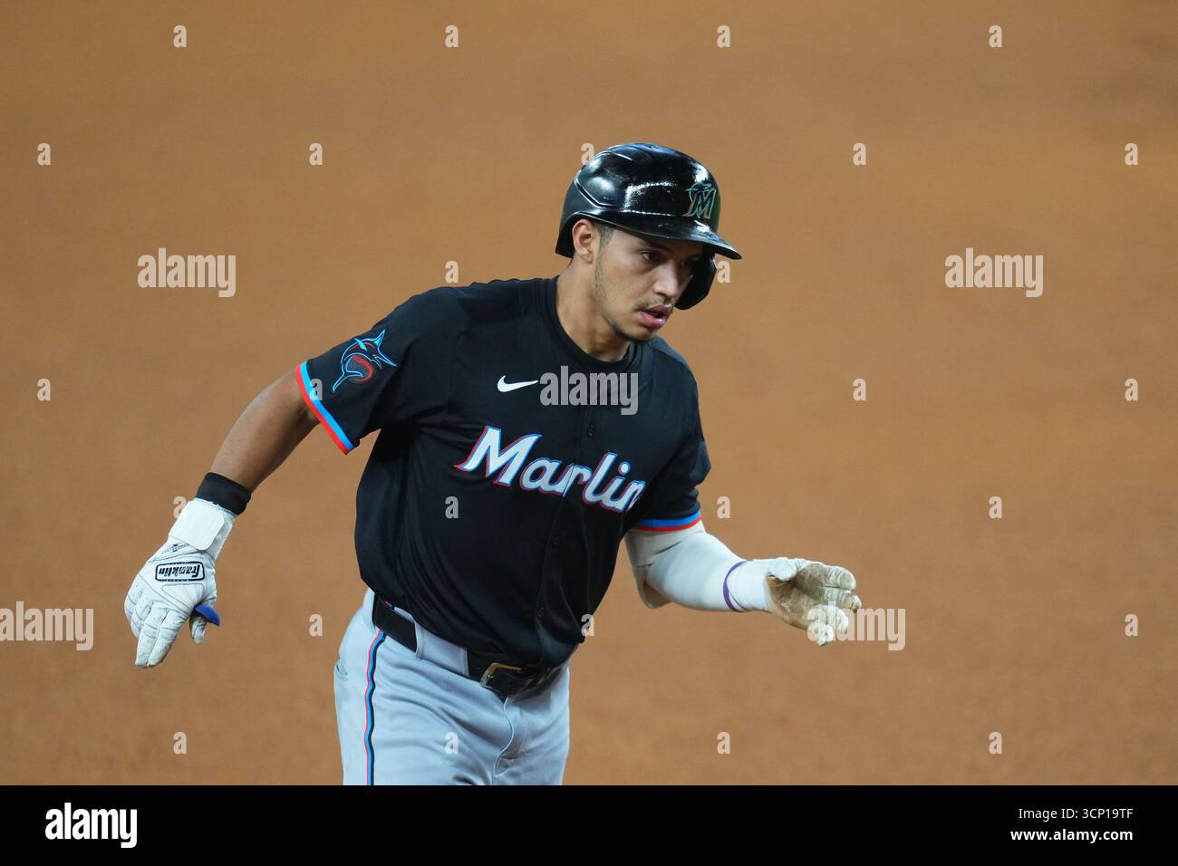 Miami Marlins' Javier Sanoja runs the bases after hitting a pinch hit ...