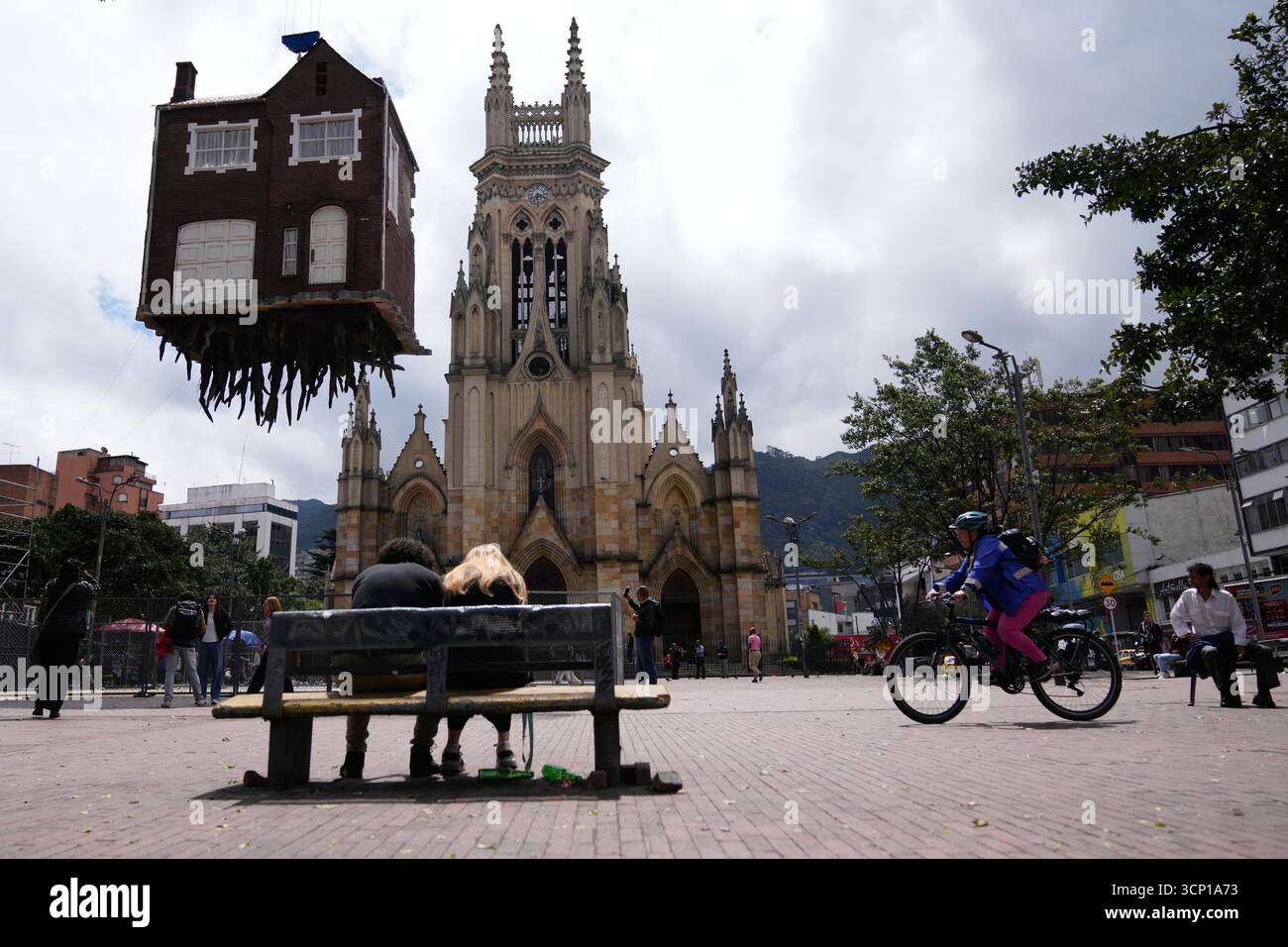 ‘Pulled by the Roots’ installation by Argentine artist Leandro Erlich ...