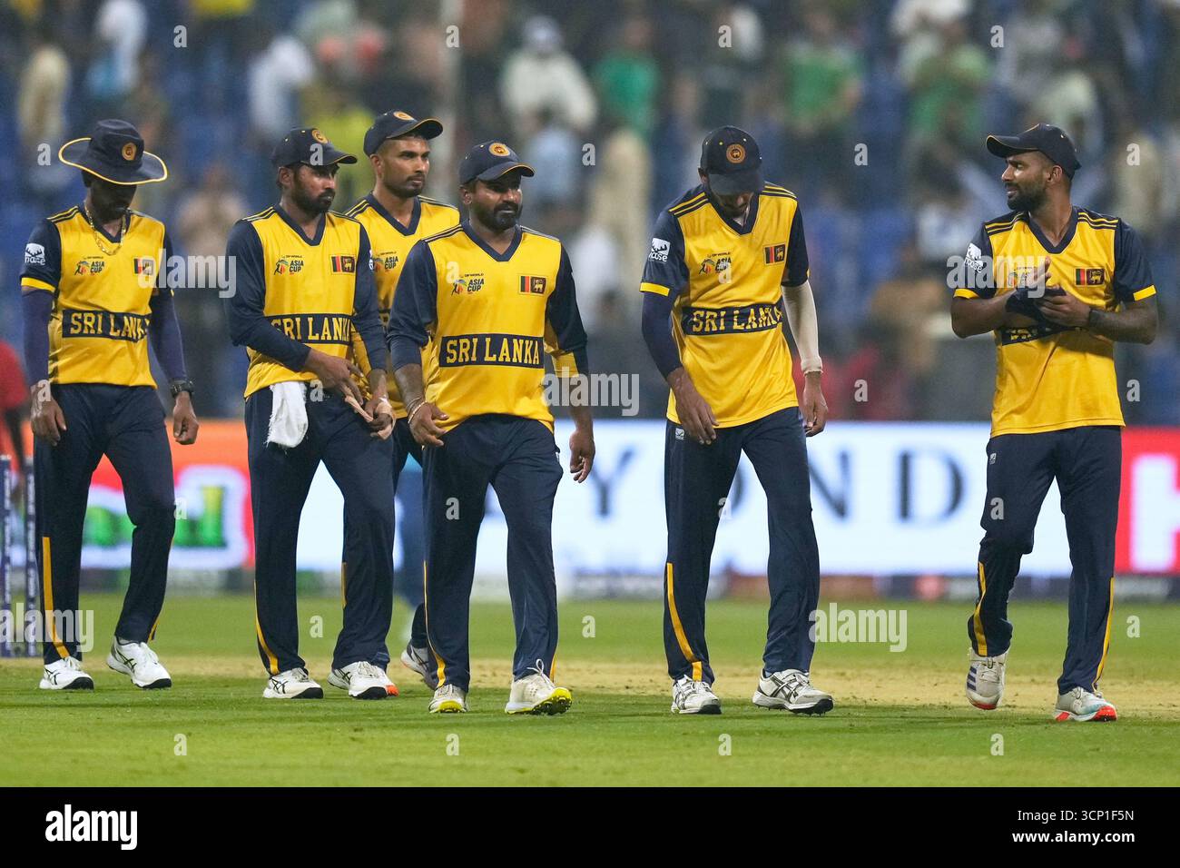 Sri Lanka's players walk off the field after loosing the Asia Cup ...