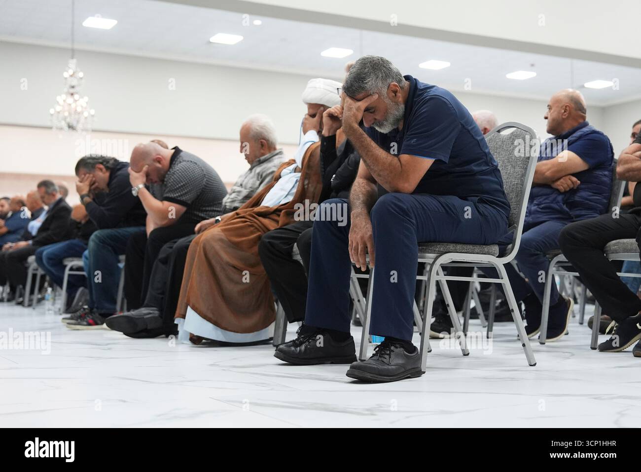 Mourners for those, including three children, killed in southern ...