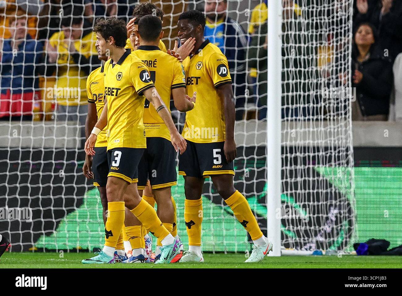 5, Marshall Munetsi of Wolverhampton Wanderers is congratulated for the ...