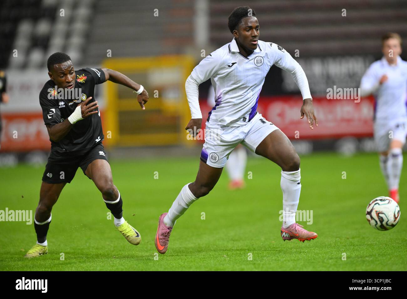 Olympic's Kima Byissa Kenny Remy and RSCA Futures' Terry van de Ven ...
