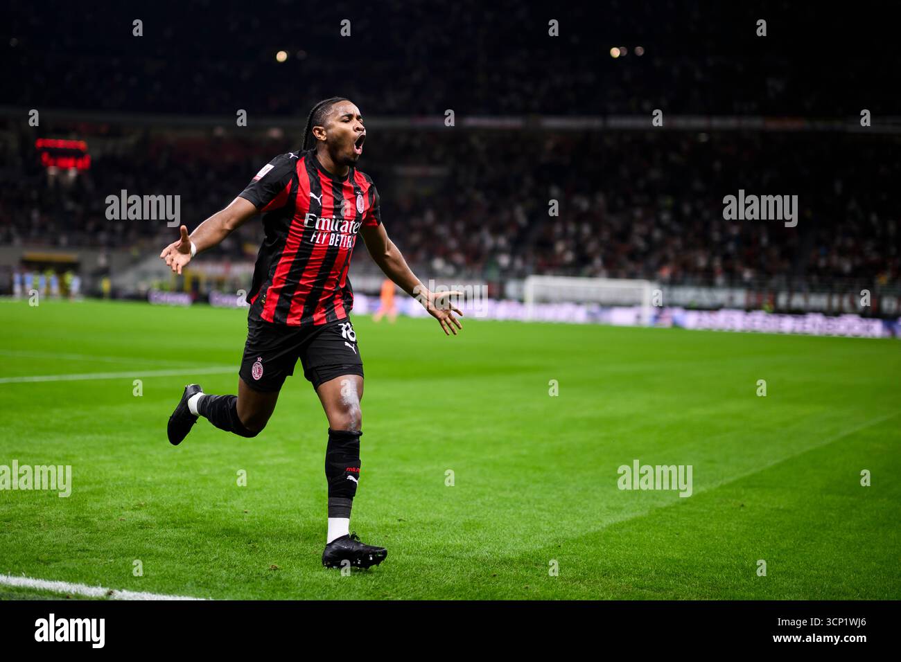 Christopher Nkunku of AC Milan celebrates after scoring a goal during ...