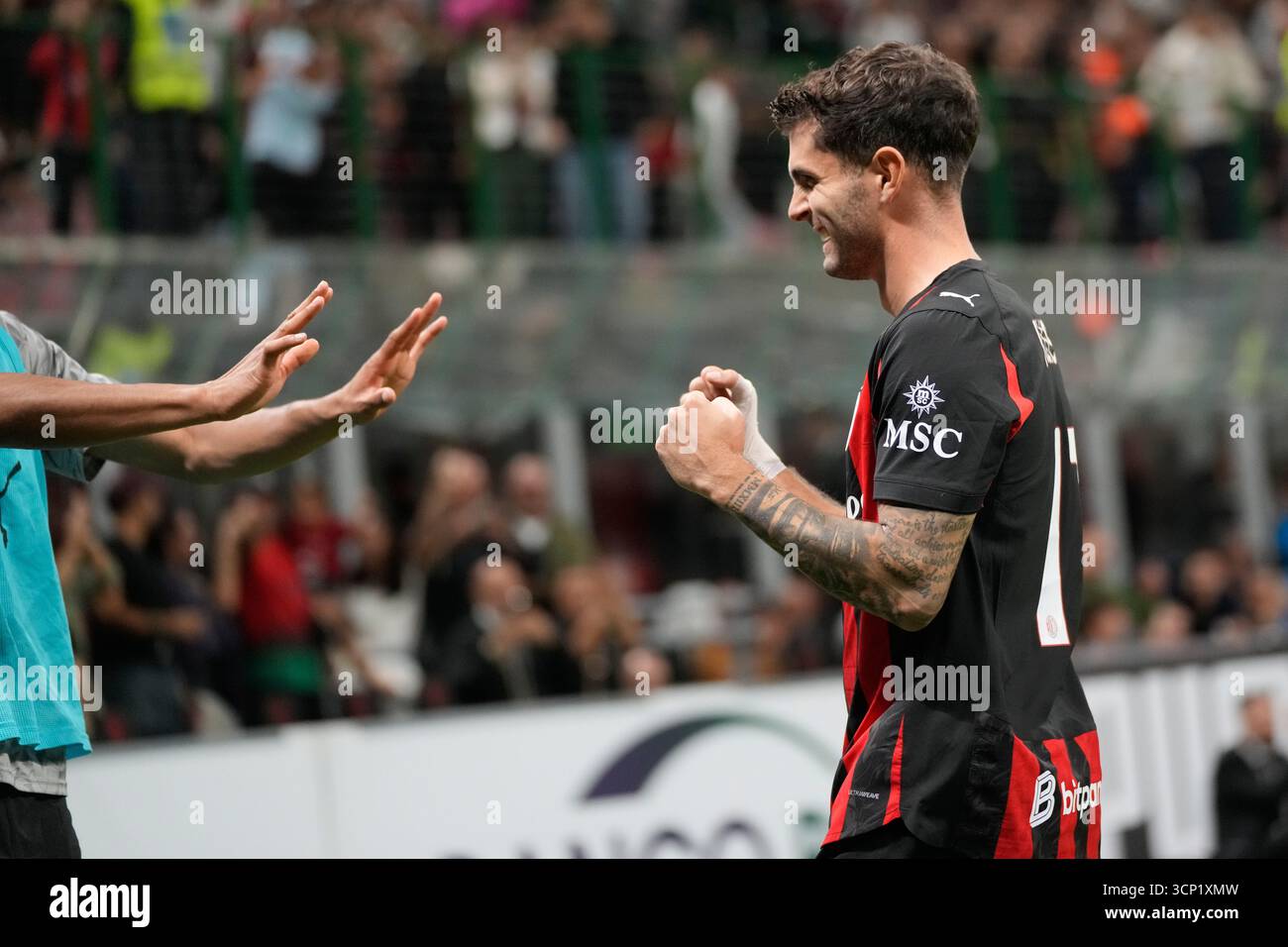 AC Milan's Christian Pulisic celebrates after scoring the third goal ...