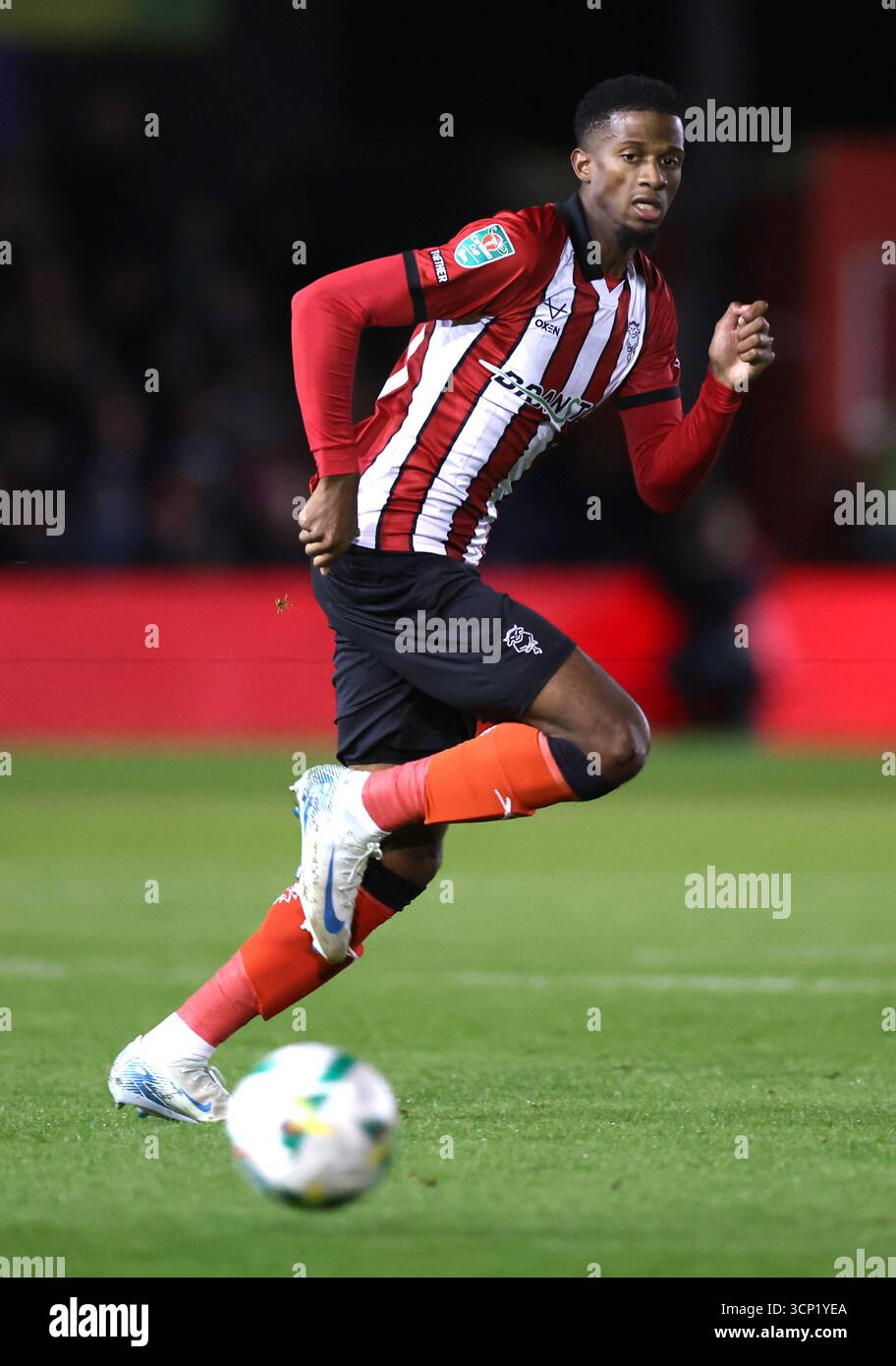 Lincoln City's Justin Obikwu in action during the Carabao Cup third ...