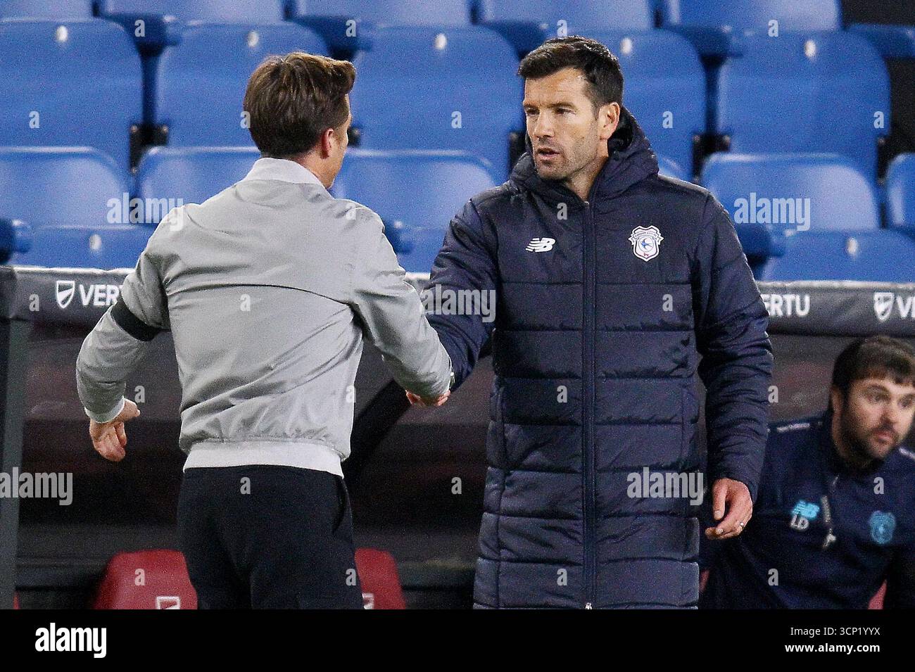 Burnley manager Scott Parker (left) and Cardiff City manager Brian ...