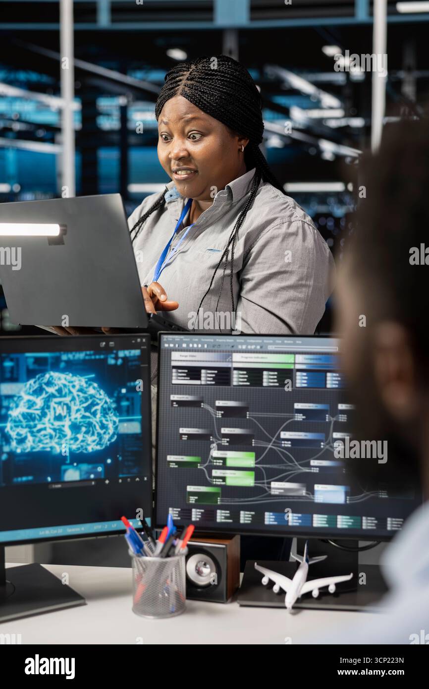 Admin in data center using artificial intelligence computerized model floored by impressive ...