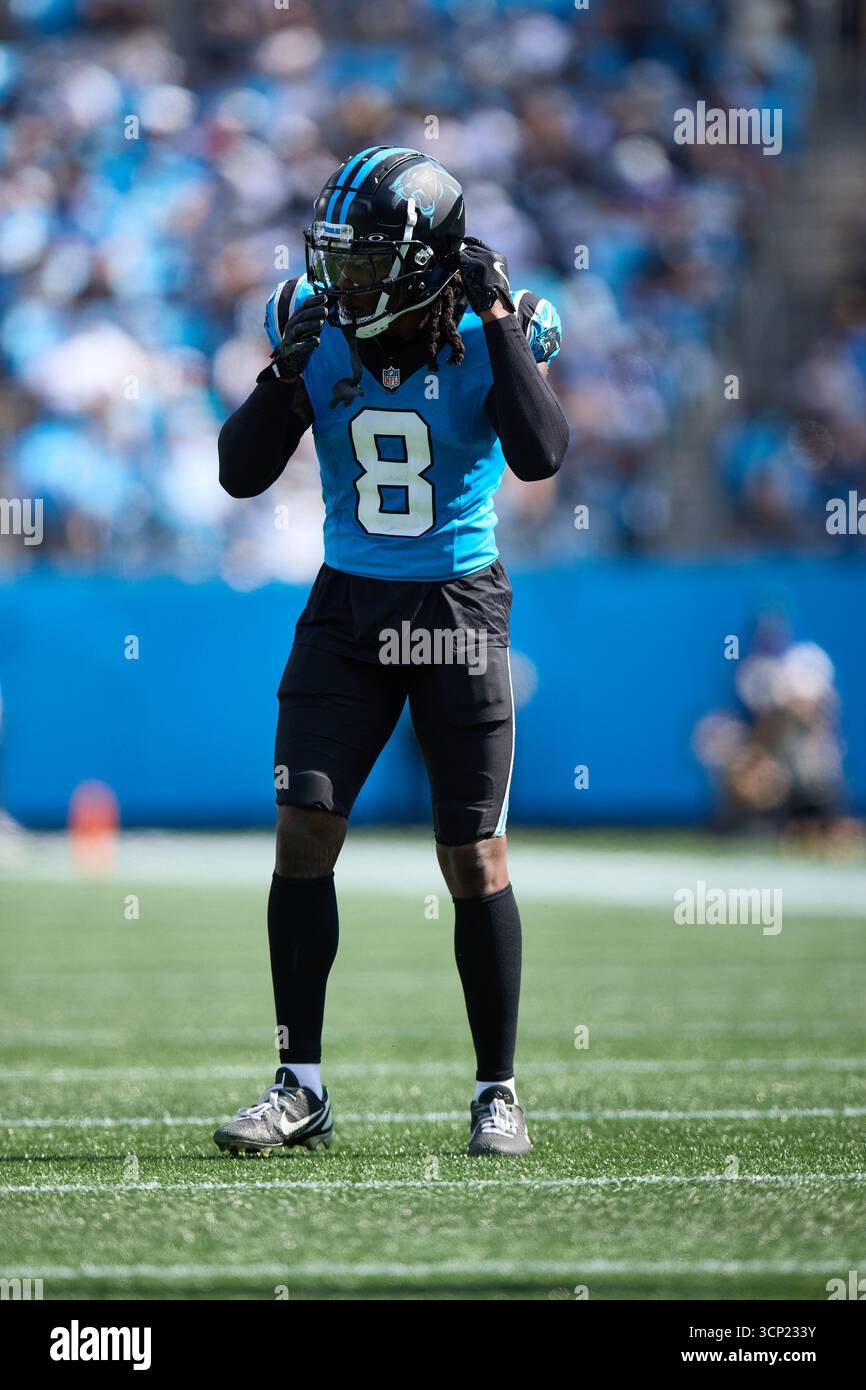 Carolina Panthers cornerback Jaycee Horn (8) adjusts his chin strap as ...