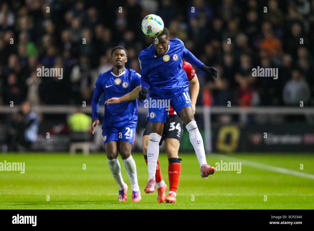 Jamie Gittens Of Chelsea heads the ball during the Lincoln City FC v ...