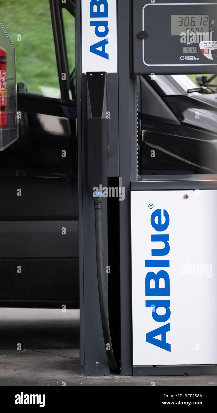 Editorial image of AdBlue fuel pump with price display at a gas station ...