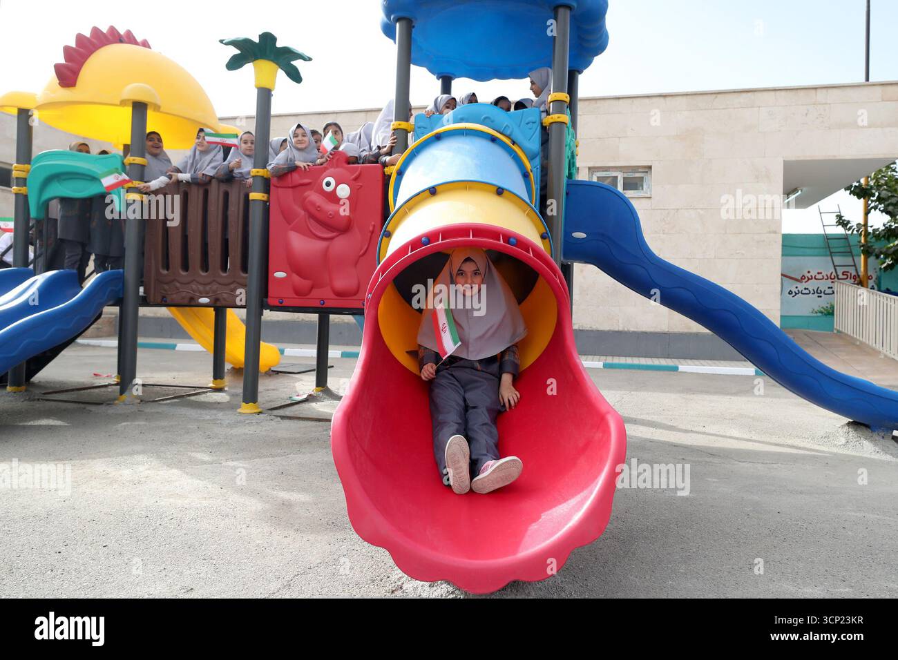 Tehran, Iran. 23rd Sep, 2025. Iranian veiled school girls attend the ...