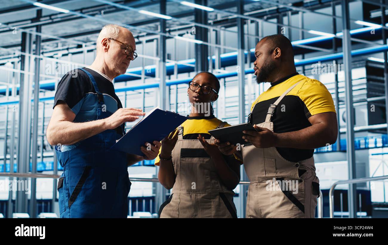 Photovoltaics smart factory team hi-res stock photography and images ...