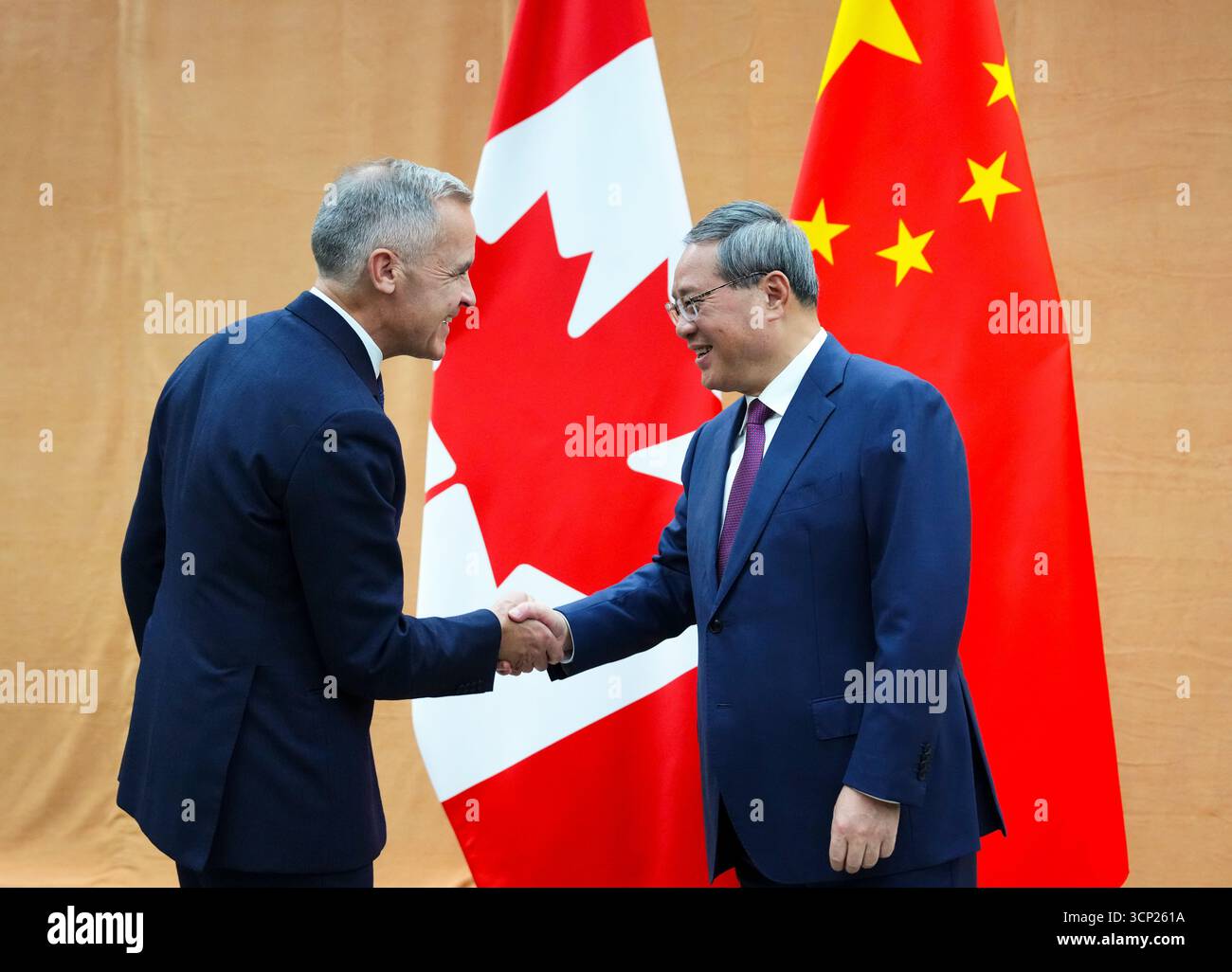 Canadian Prime Minister Mark Carney, left, takes part in a meeting with ...
