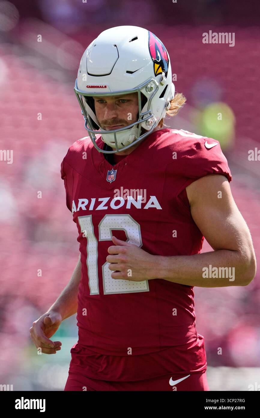 Arizona Cardinals punter Blake Gillikin warms up before an NFL football ...