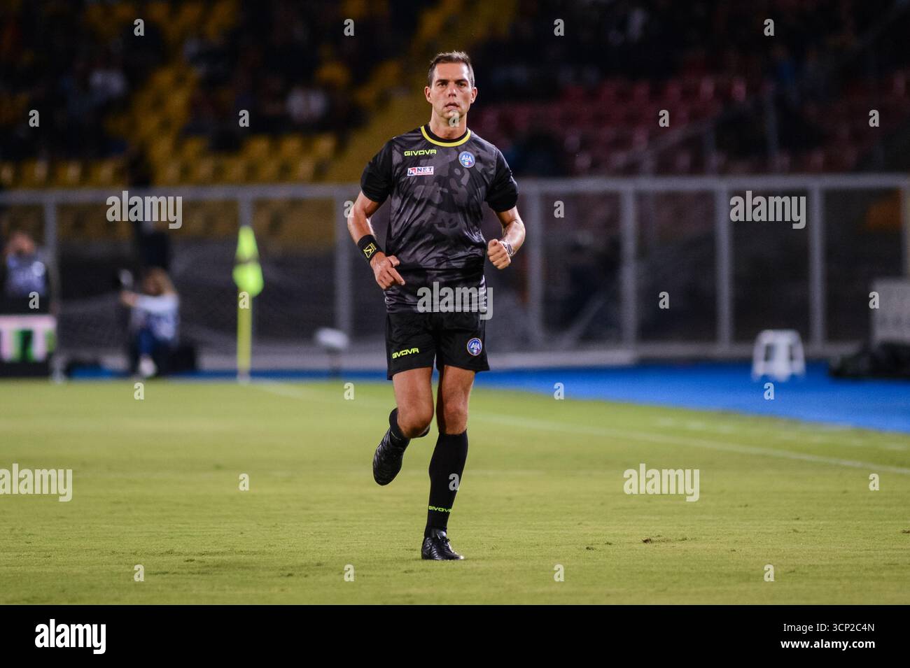 LECCE, ITALY - SEPTEMBER 19: referee Luca Zufferli warming up during ...
