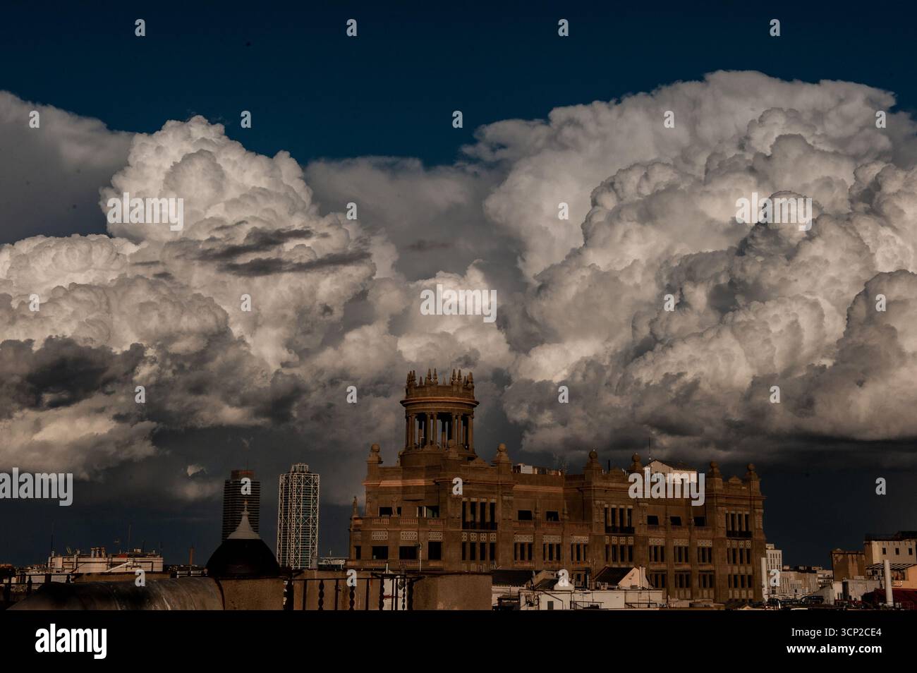 23 Sep 2025, Barcelona, Spain: Towering cumulonimbus clouds crown ...