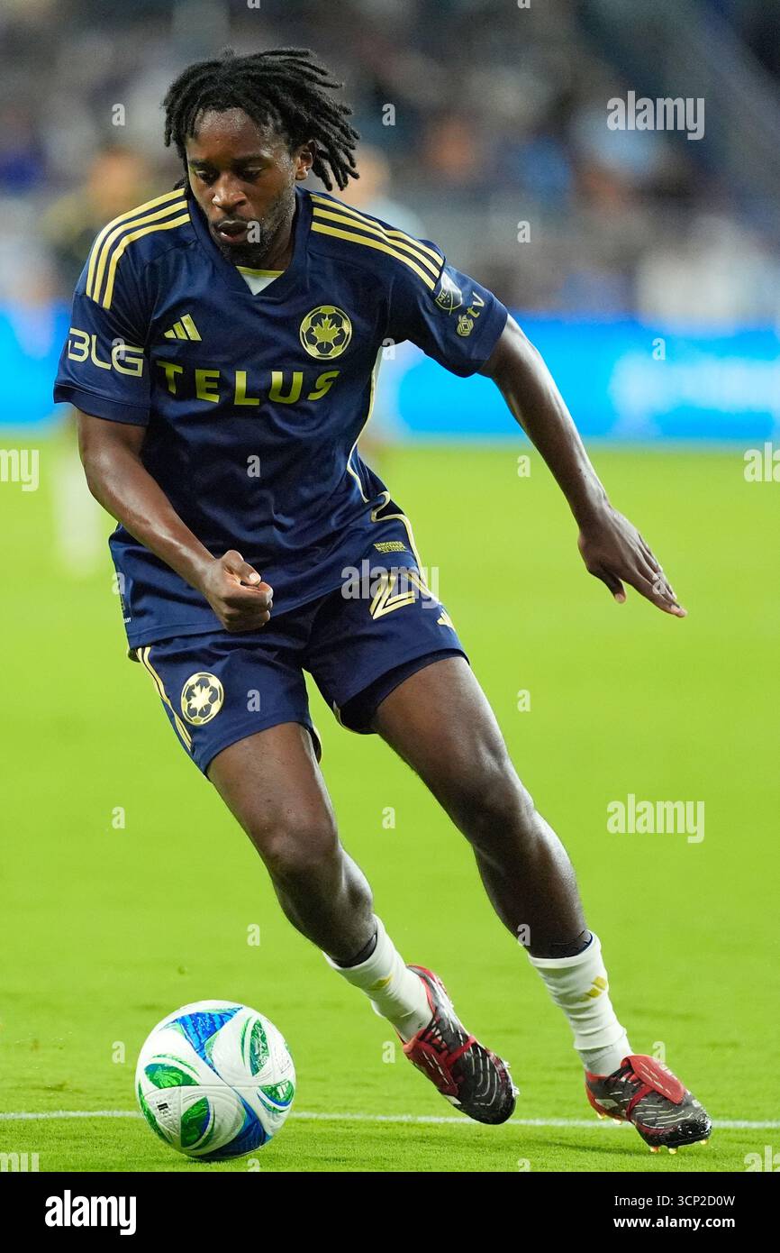 Vancouver Whitecaps midfielder Jean-Claude Ngando moves the ball during ...