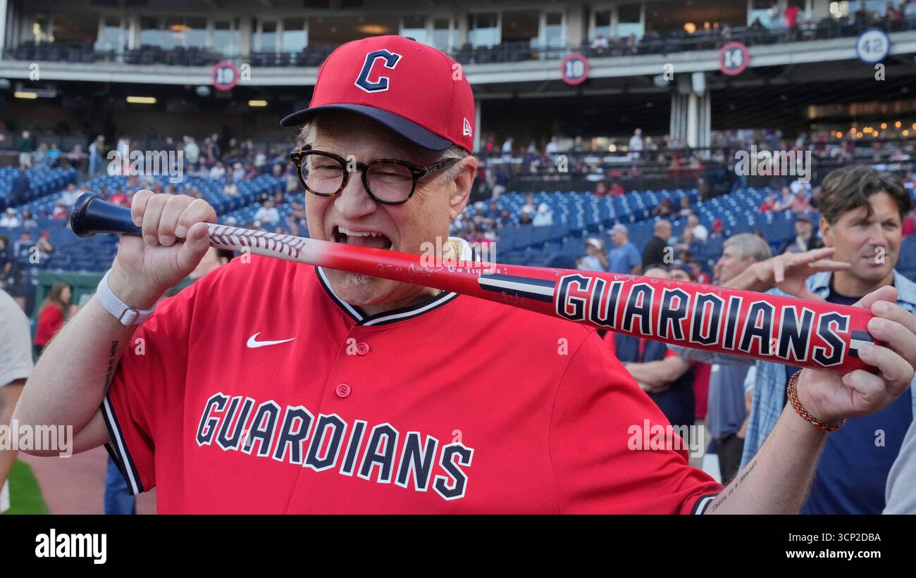 Comedian Drew Carey clowns around before delivering the game ball ...