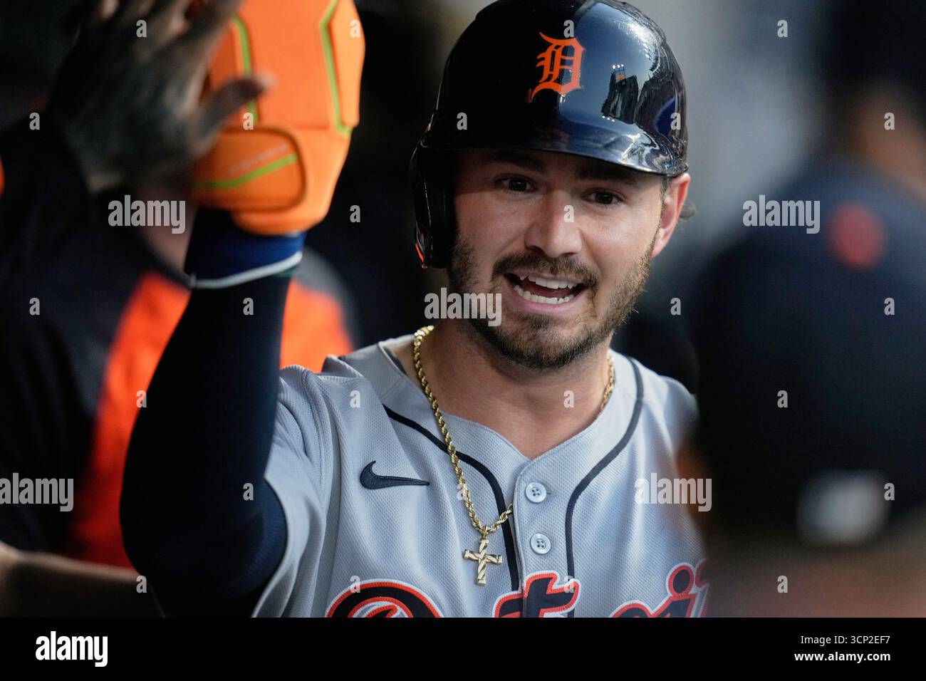 Detroit Tigers' Zach McKinstry is congratulated in the dugout after ...