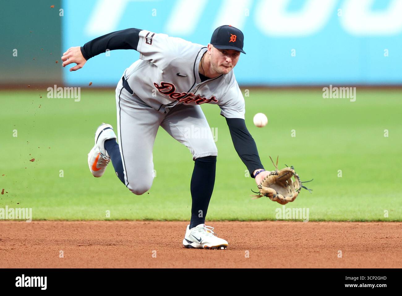 Detroit Tigers Trey Sweeney (27) is unable to make a play on a ball hit ...