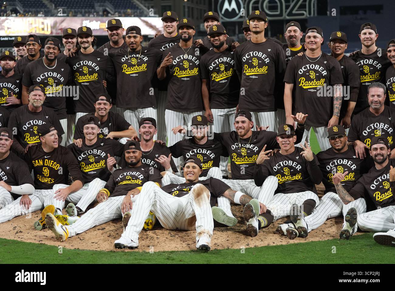 Members of the San Diego Padres pose for a picture after defeating the ...