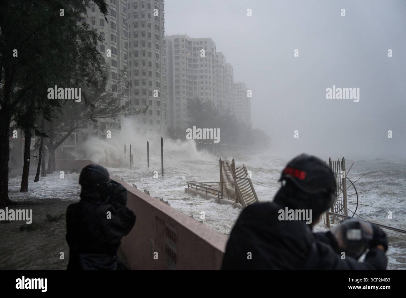 Hong Kong During Typhoon Ragasa Waves splashing onto a promenade ...