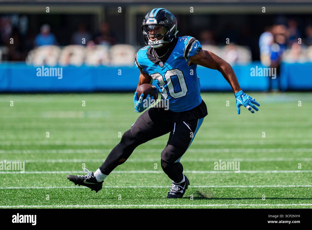 Carolina Panthers running back Chuba Hubbard (30) runs with the ball ...