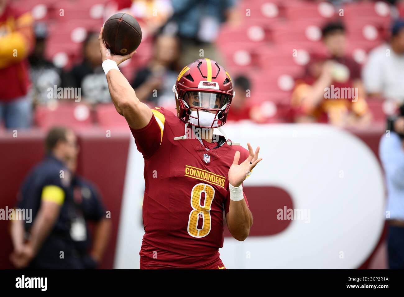 Washington Commanders quarterback Marcus Mariota (8) warms up before an ...